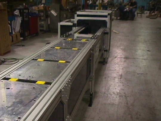 Over Under Conveyor -Micco Lucent